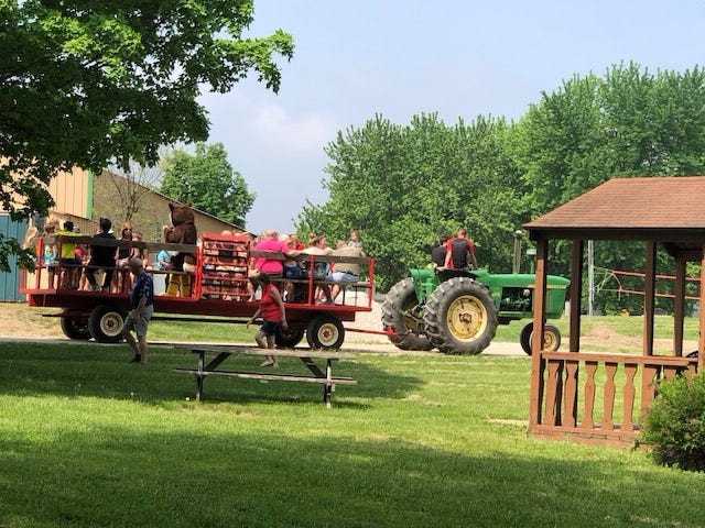 Hay ride. This campground just played “Wait for… | by Linda B. | Medium