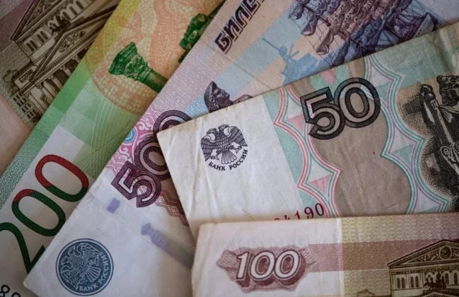 As the rouble declines, Russia raises interest rates to 12 percent ...