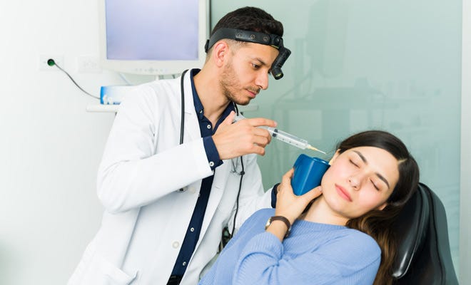 Ear wax removal | ear syringing | Ear Microsuction | Kent | Dartford ...