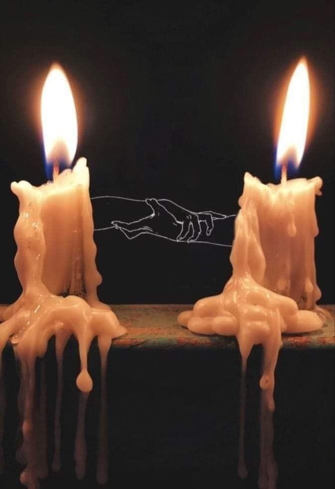 In the light of the candles on the table, their eyes met, shining with ...