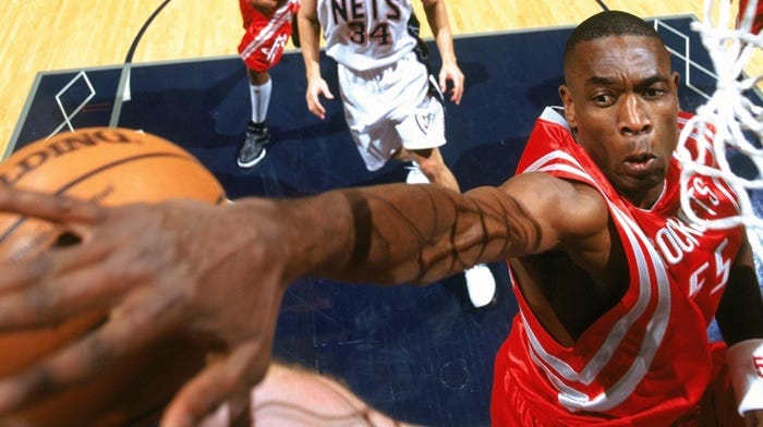 Mutombo Blocking A Shot
