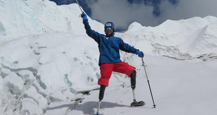 40 years after losing both his legs to Everest, Chinese climber finally ...