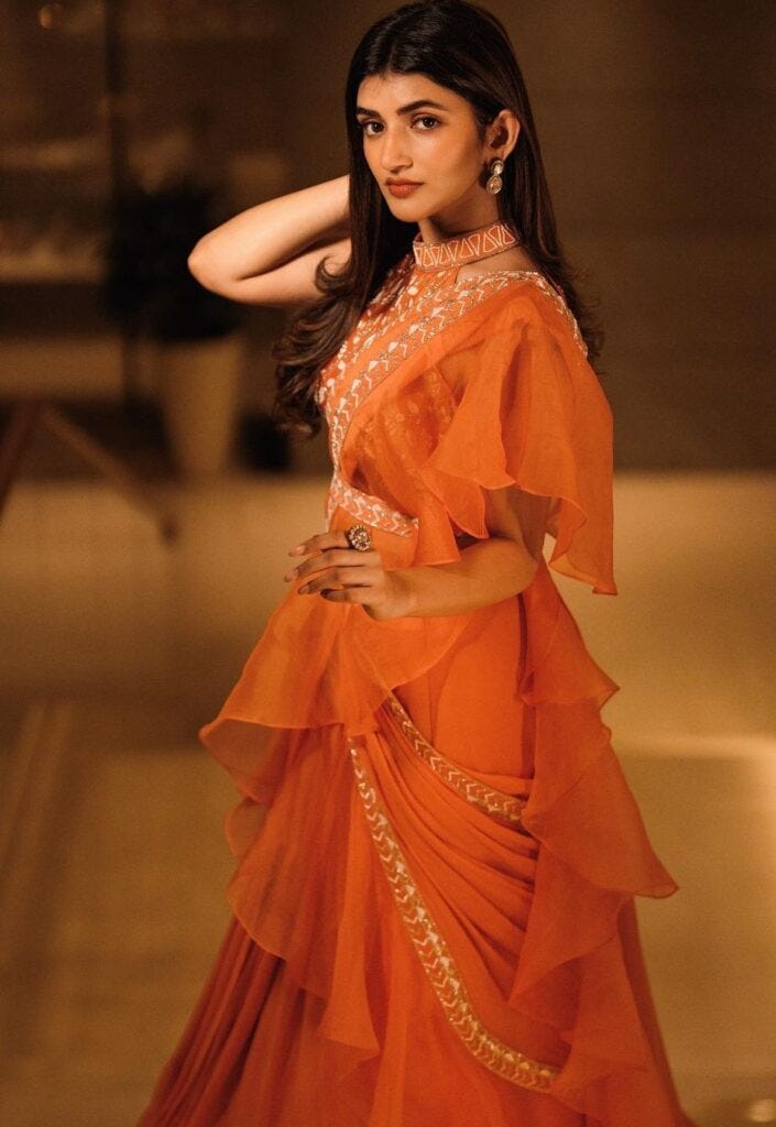 Sreeleela exudes her grace in an orange ruffle saree | by TollywoodNews ...