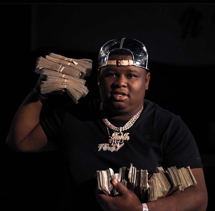 Rappers Holding Money