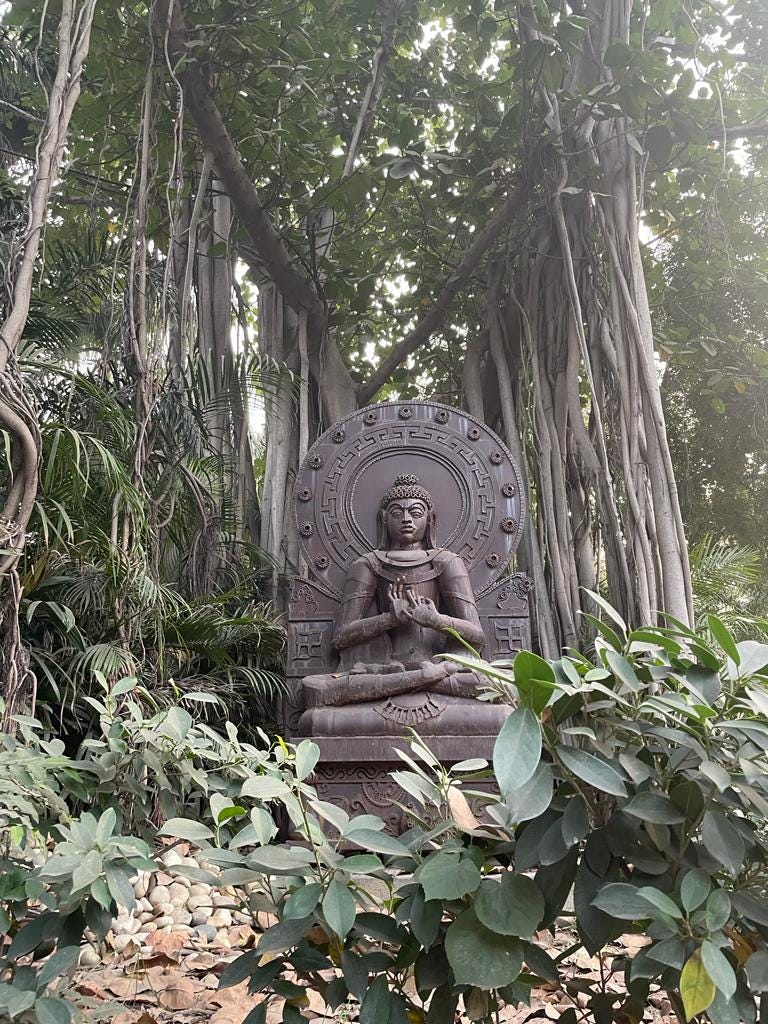 Buddha Statue in a Silent Prayer Under the Banyan Tree | by Dr. Preeti ...