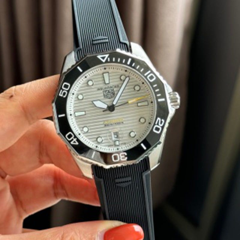 Between the Tides: Time Poems from the TAG Heuer Aquaracer Diving ...