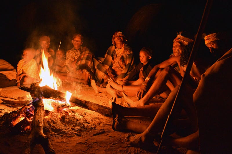 African People Dancing Around Fire