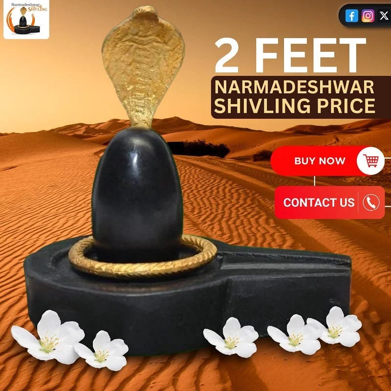 a black stone with gold leaf on top and white flowers on sandAre you ...