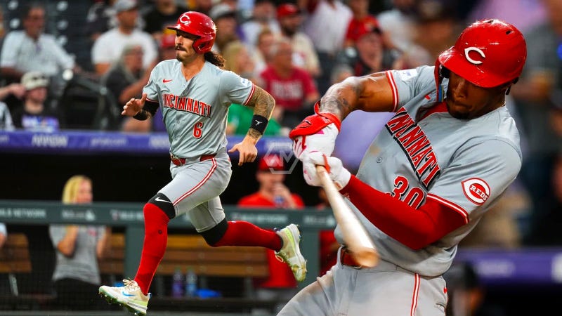 The Reds beat the Rockies 13–3 behind Benson, Candelario, and ...