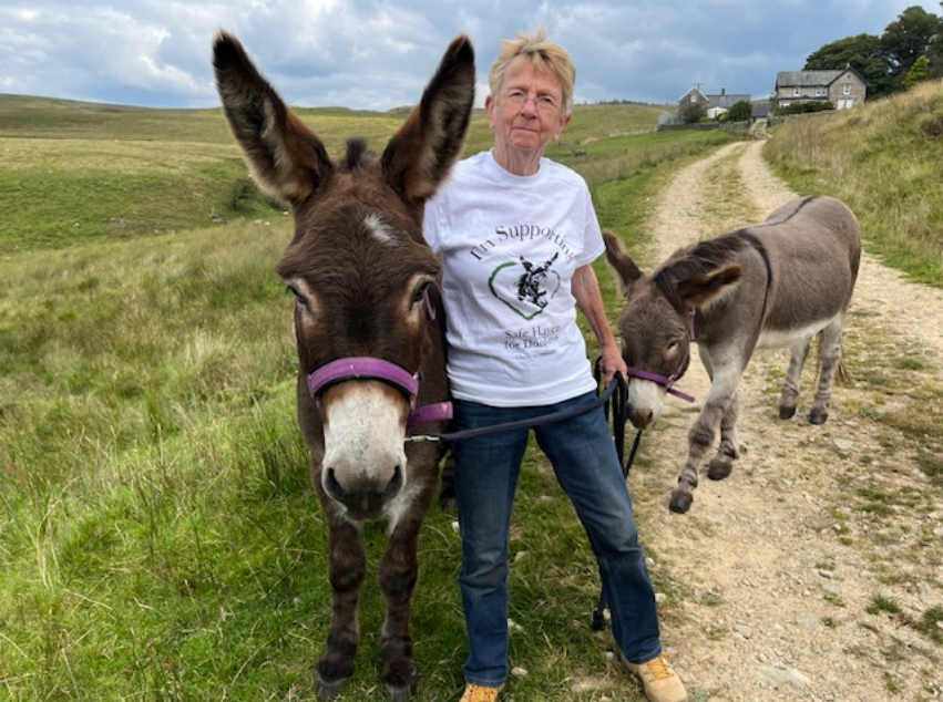 Scottish woman conquers Cumbrian fells with pet donkeys to raise funds ...