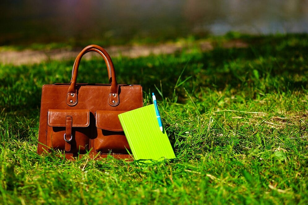 What to look for when buying a leather bag | by carryme bags | Medium